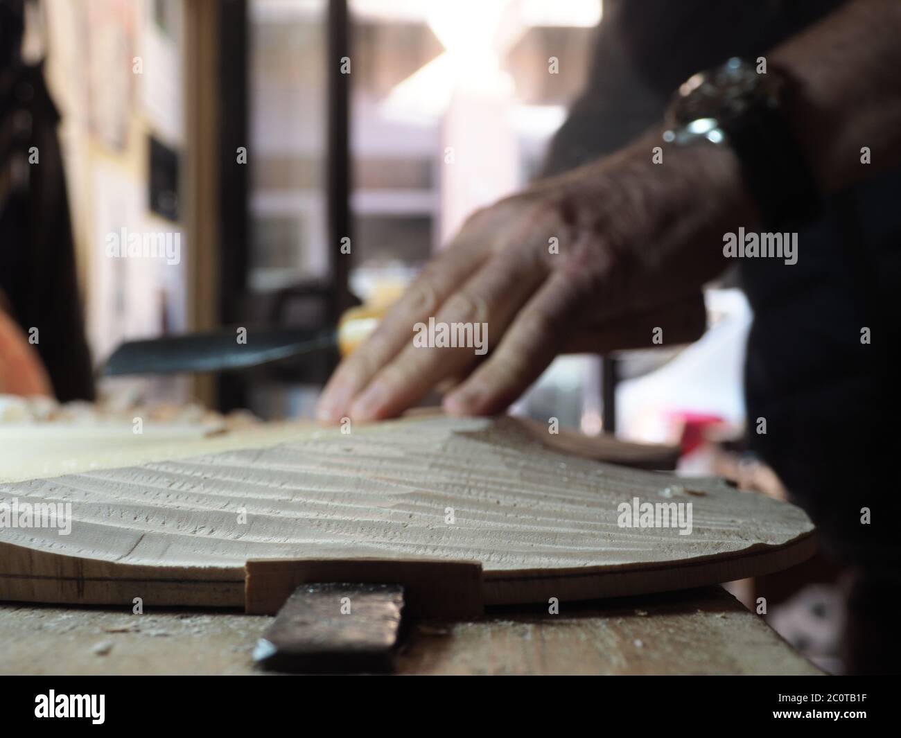 Professional luthier violinmaker artisan Robert Gasser working on ...