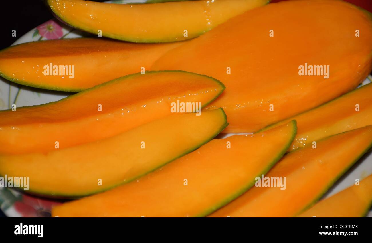 Close up of Delicious Indian Mango Slices or Cut Pieces. It is also ...