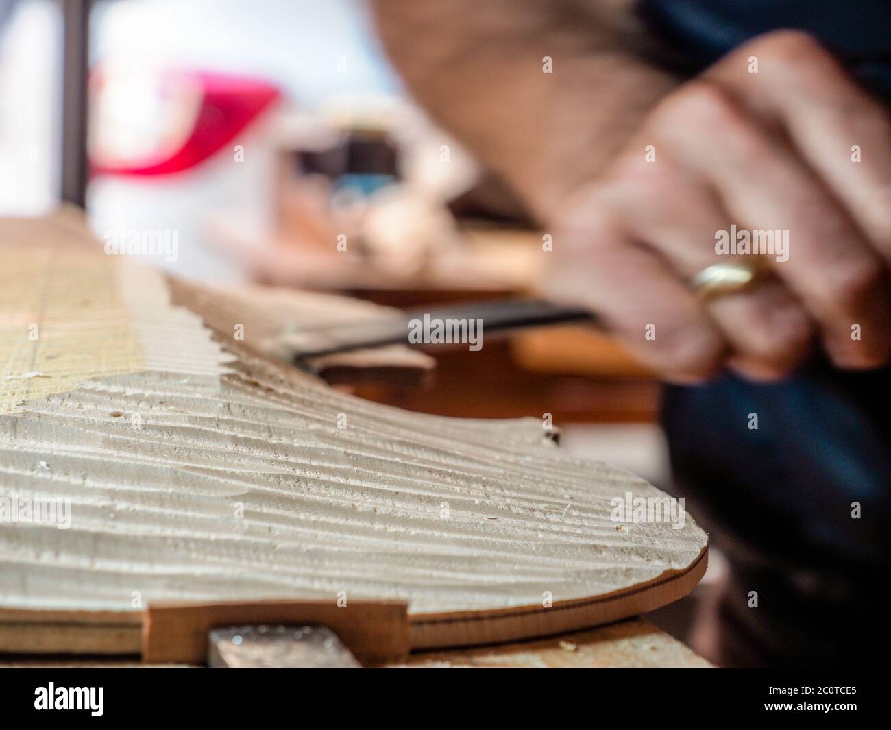 Professional luthier violinmaker artisan Robert Gasser working on ...