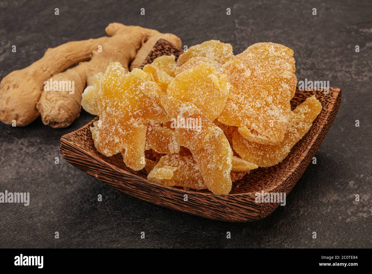 Dry sweet ginger snack in the bowl Stock Photo - Alamy