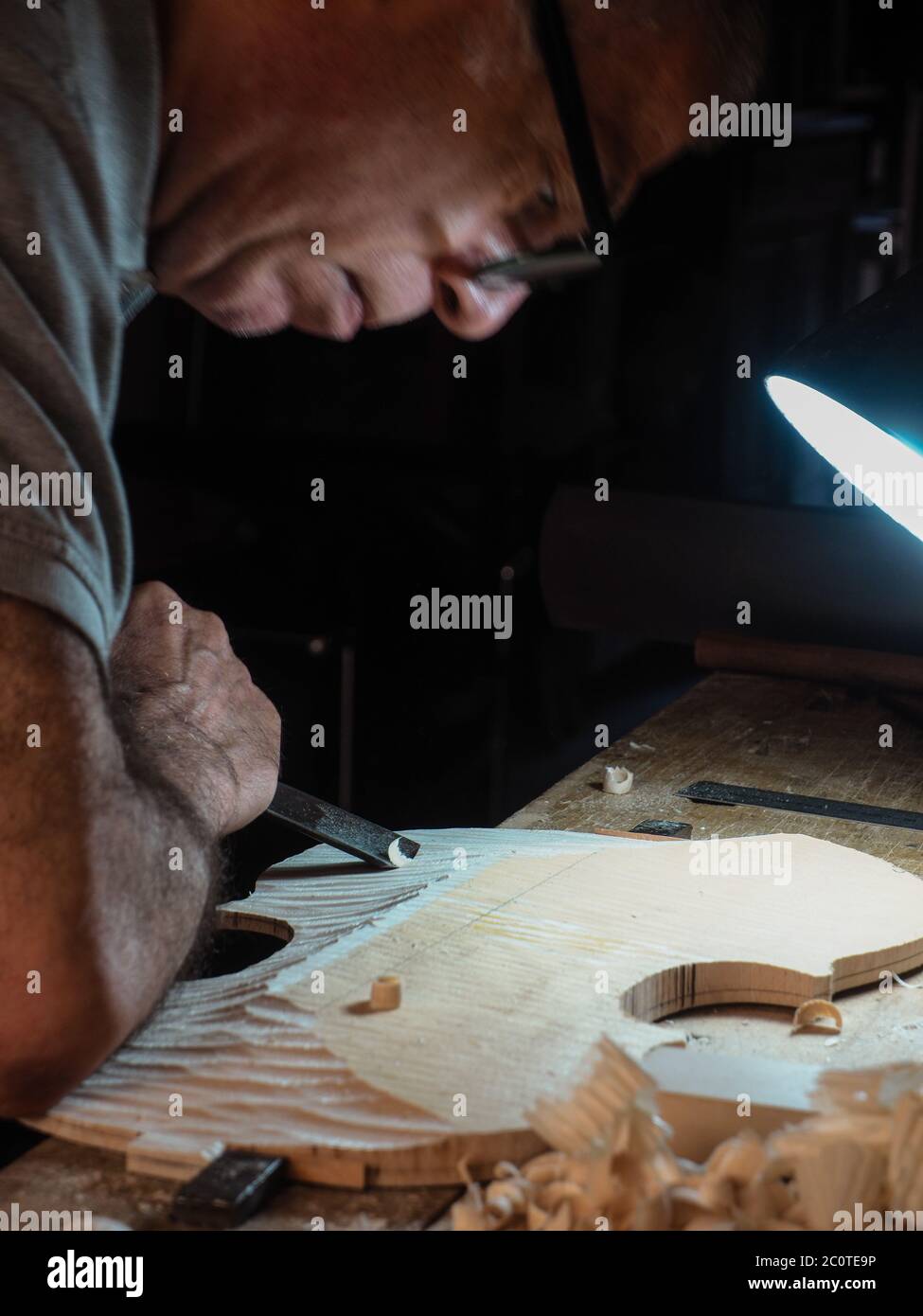 Professional luthier violinmaker artisan Robert Gasser working on ...