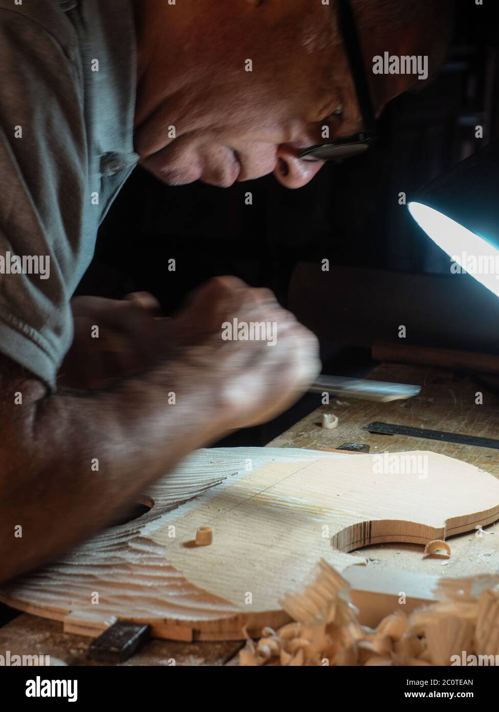 Professional luthier violinmaker artisan Robert Gasser working on ...