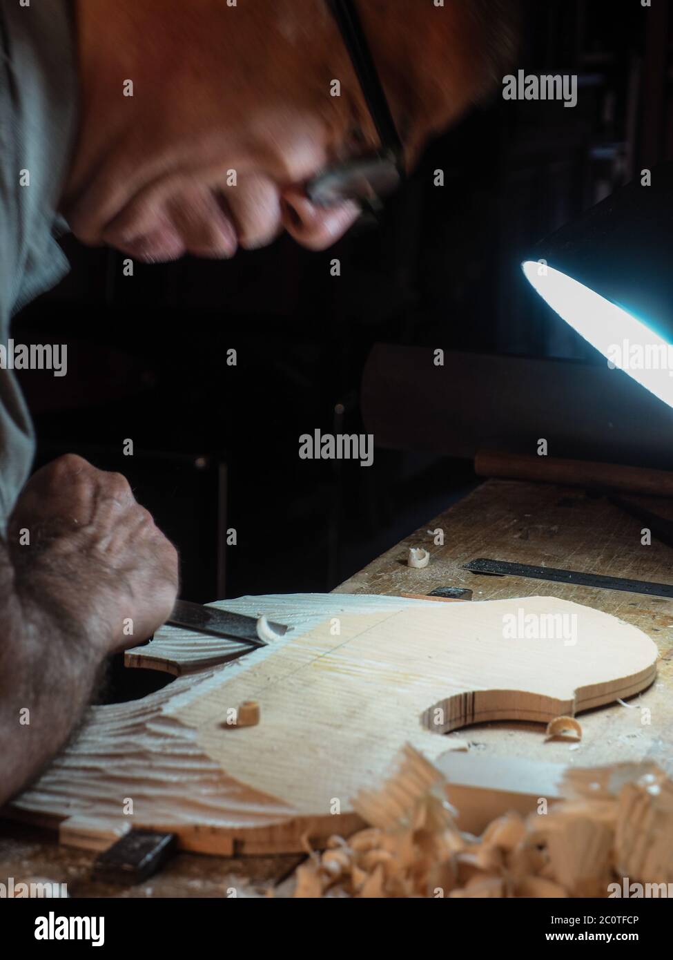 Professional luthier violinmaker artisan Robert Gasser working on ...