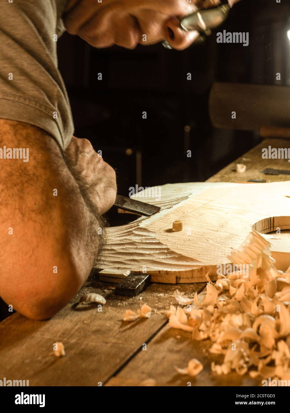 Professional luthier violinmaker artisan Robert Gasser working on ...