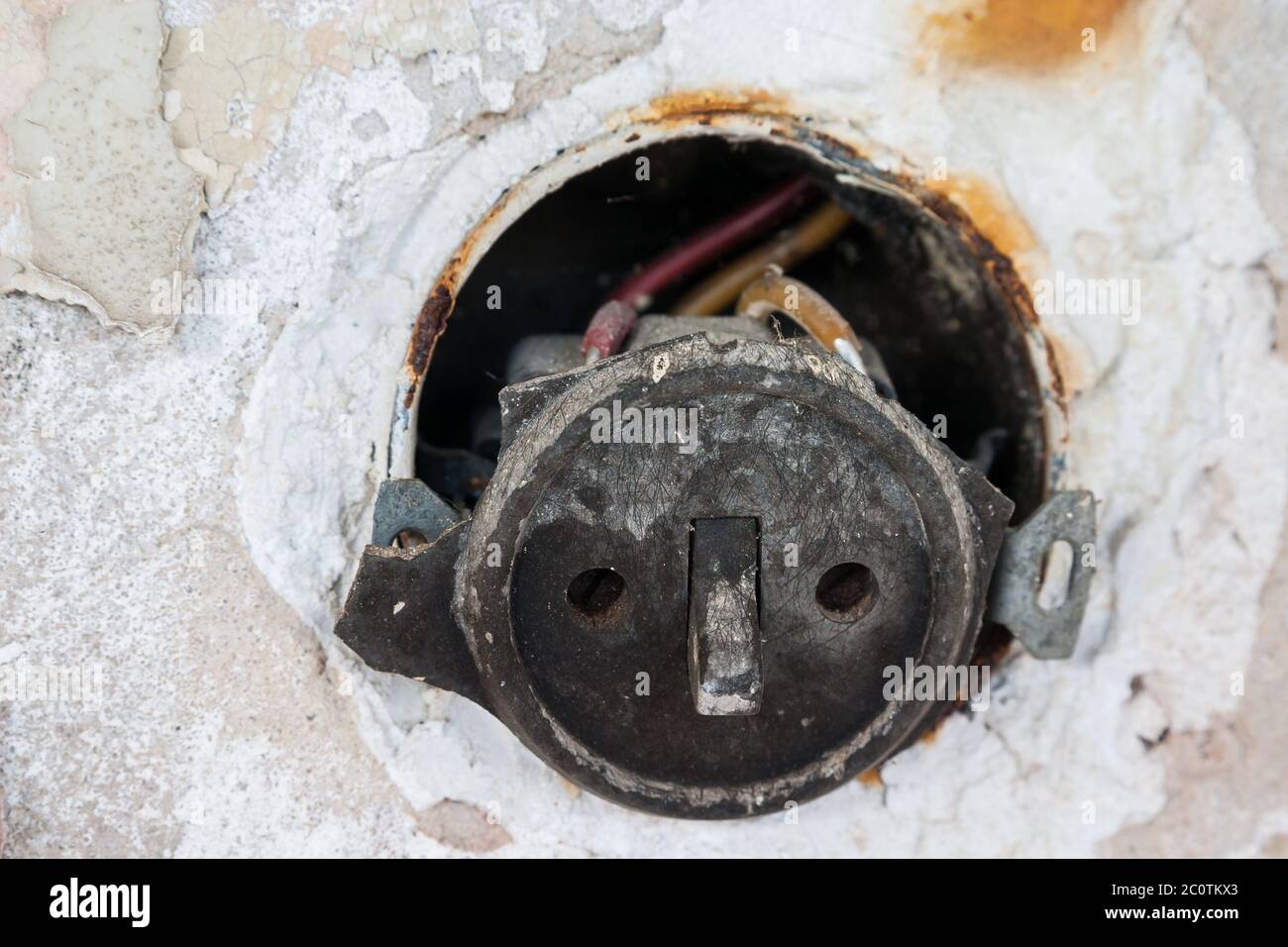 old defective toggle switch with metal flush-mounted box Stock Photo ...