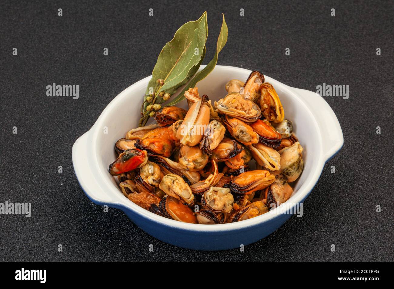 Pickled mussels with spices in the bowl Stock Photo - Alamy