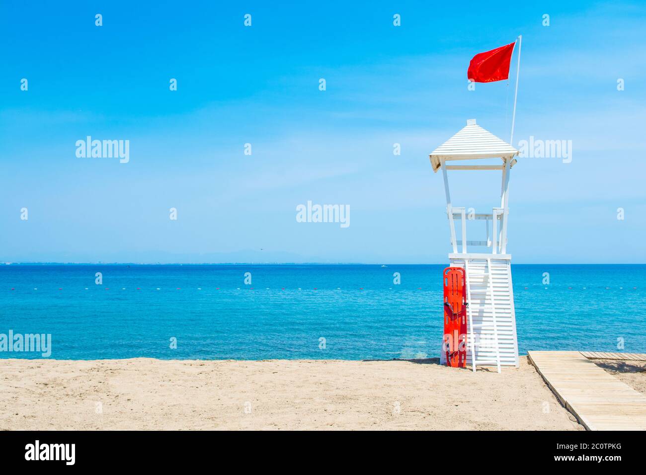 White wooden rescue tower for lifeguards on the beach of the ...