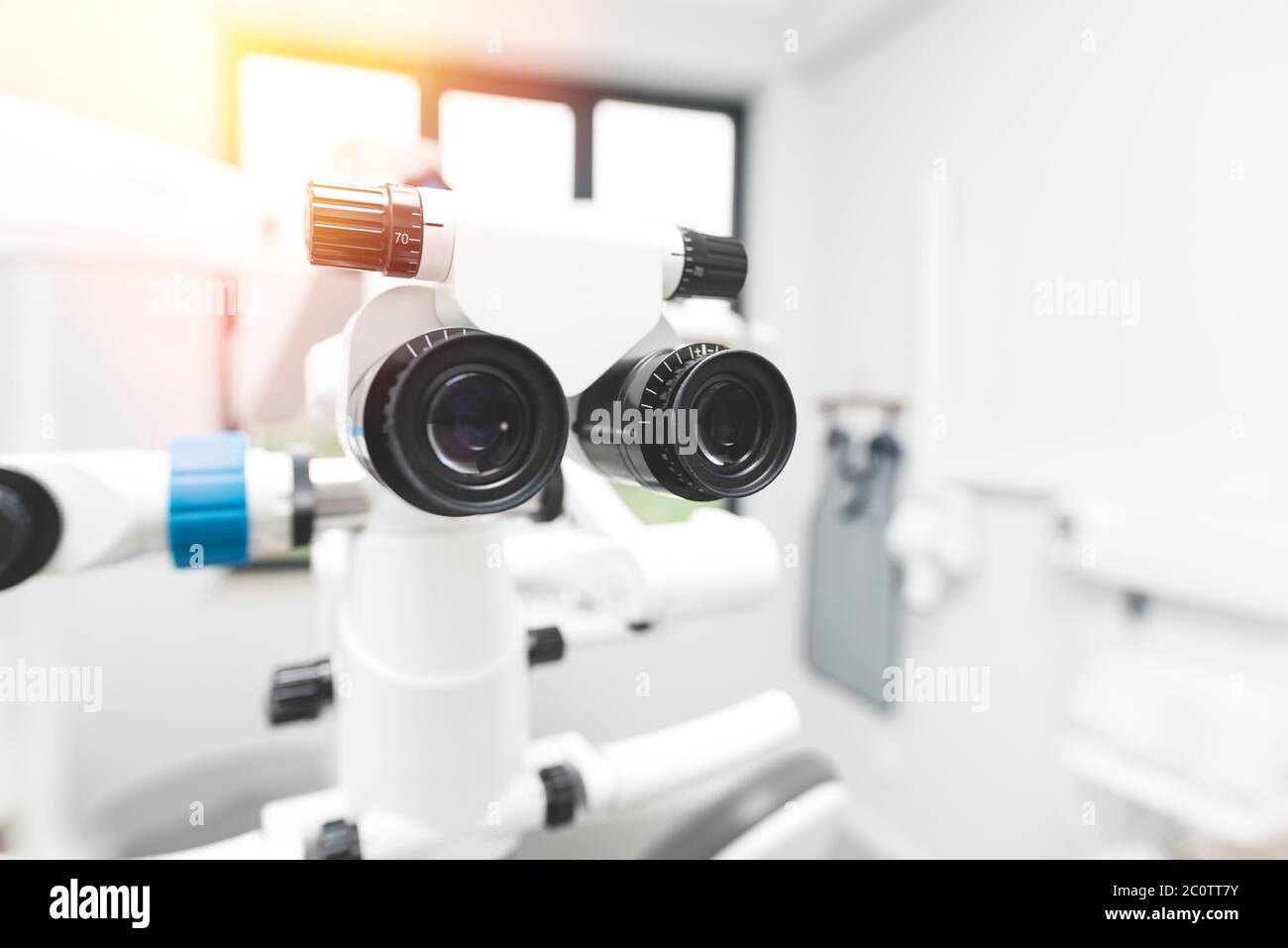 Dental endodontic binocular microscope. Closeup of a dentist microscope ...