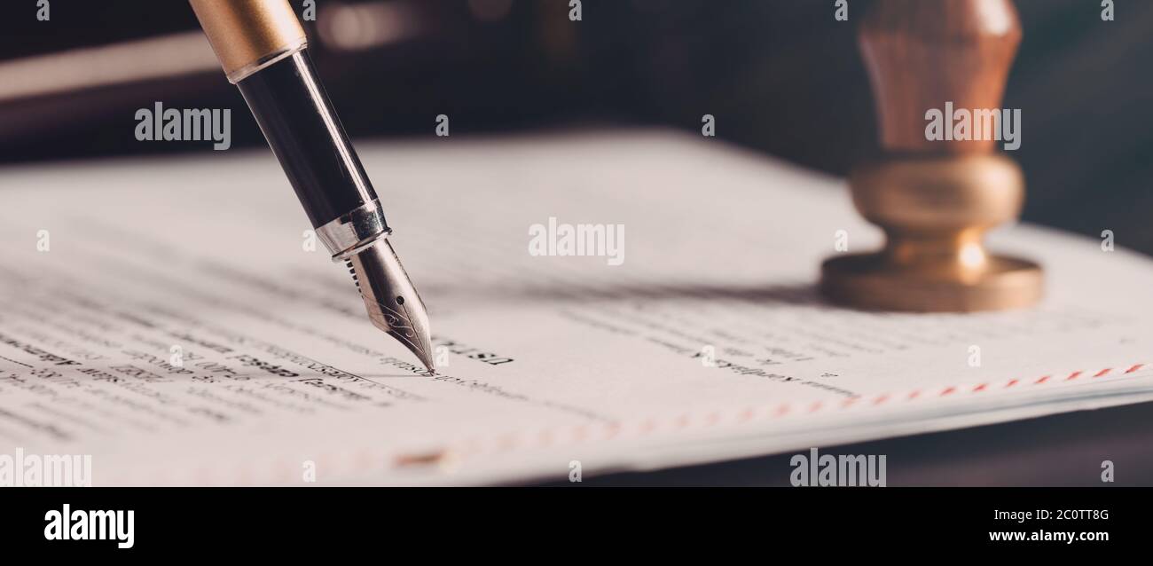 Law, notary background theme. Fountain pen and handmade paper on desk ...