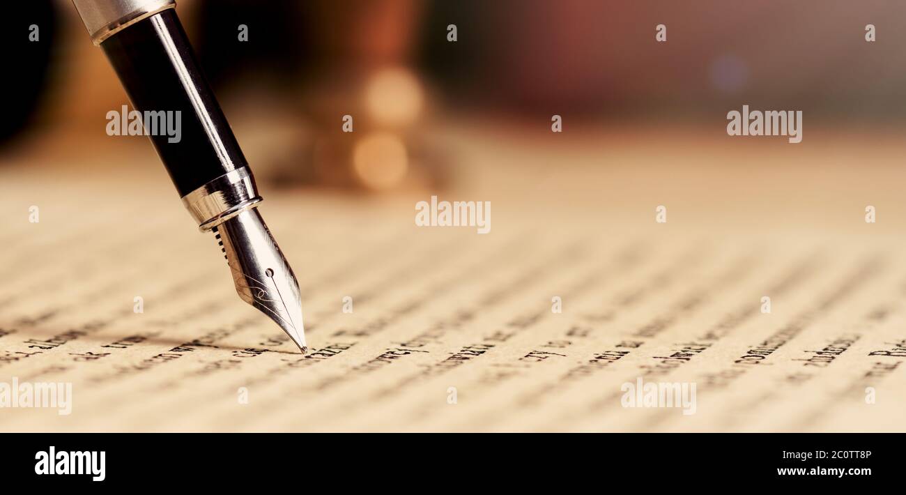 Law, notary background theme. Fountain pen and handmade paper on desk ...