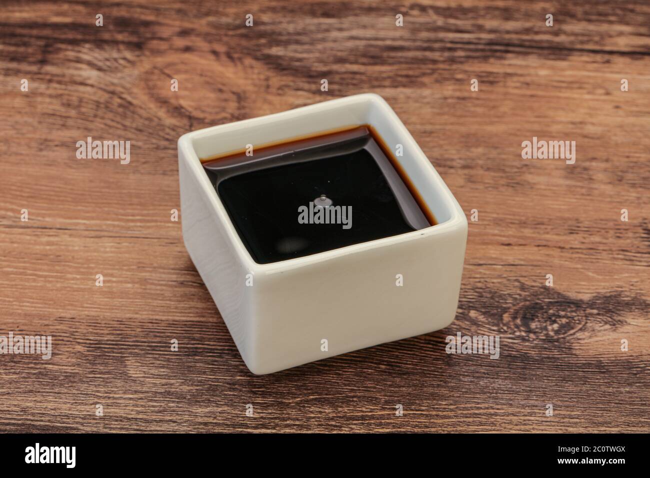 Asian cuisine - soya sauce in the bowl Stock Photo - Alamy