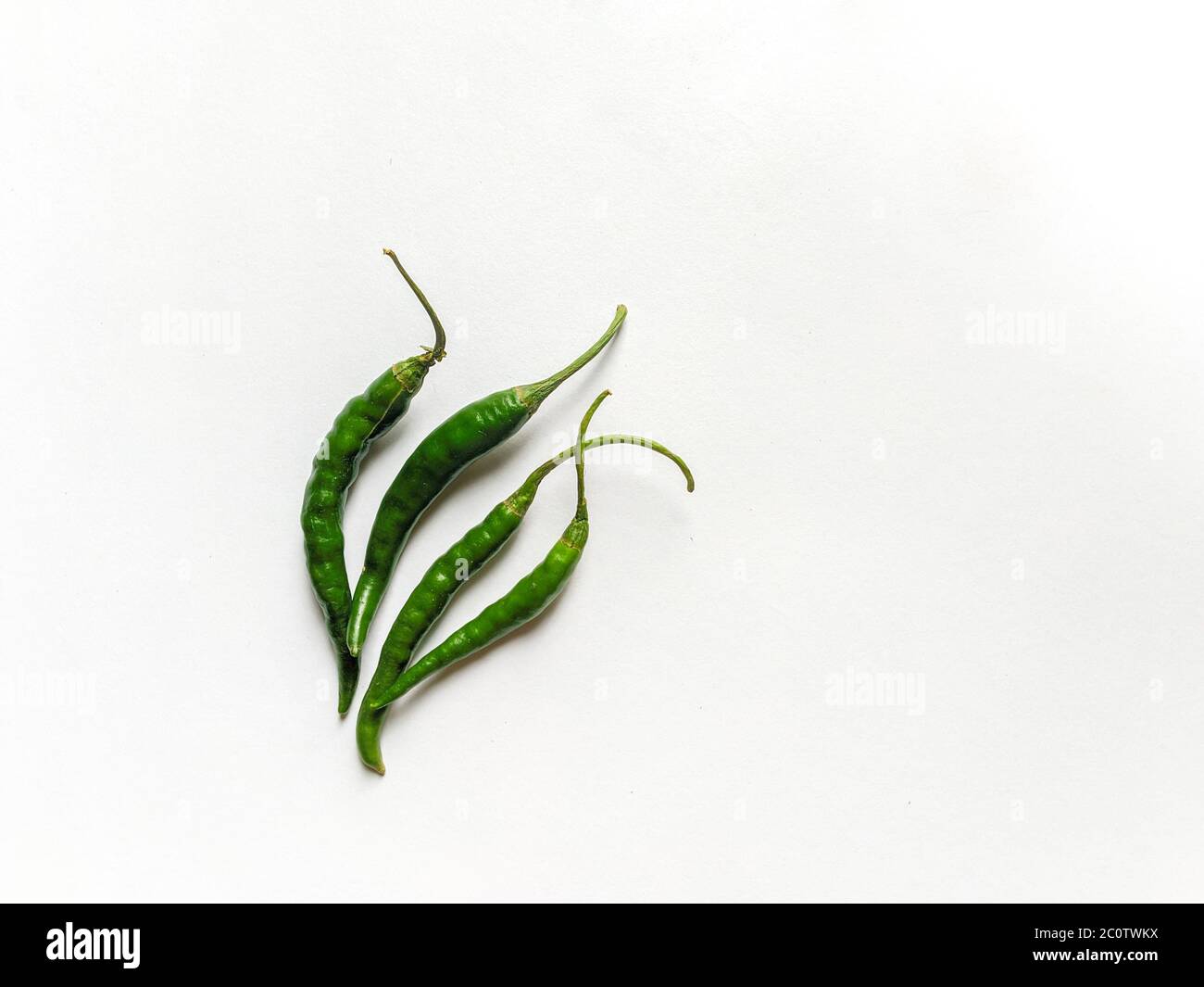 Green chilli isolated stock image Stock Photo - Alamy