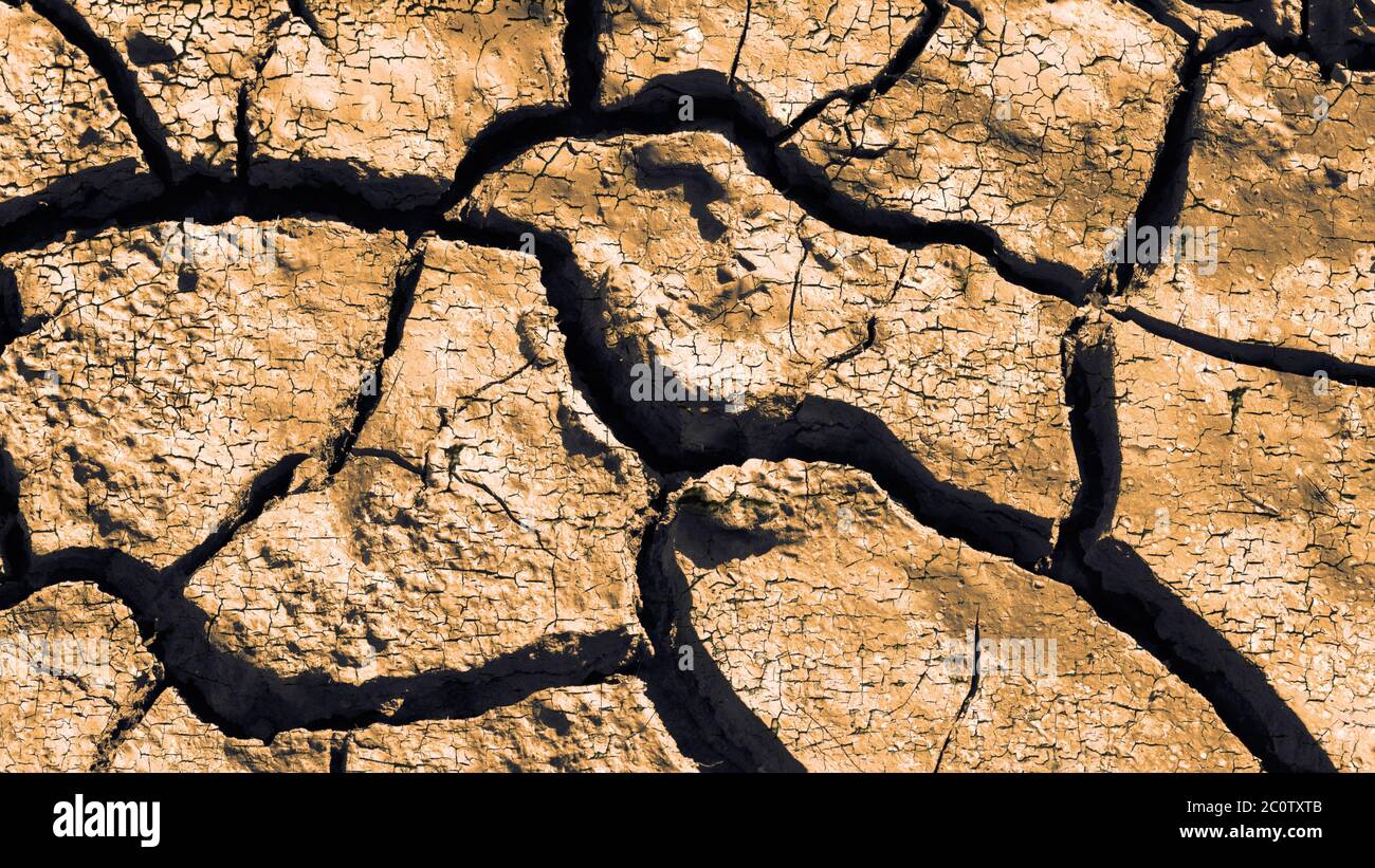 Dry cracked clay background Stock Photo - Alamy