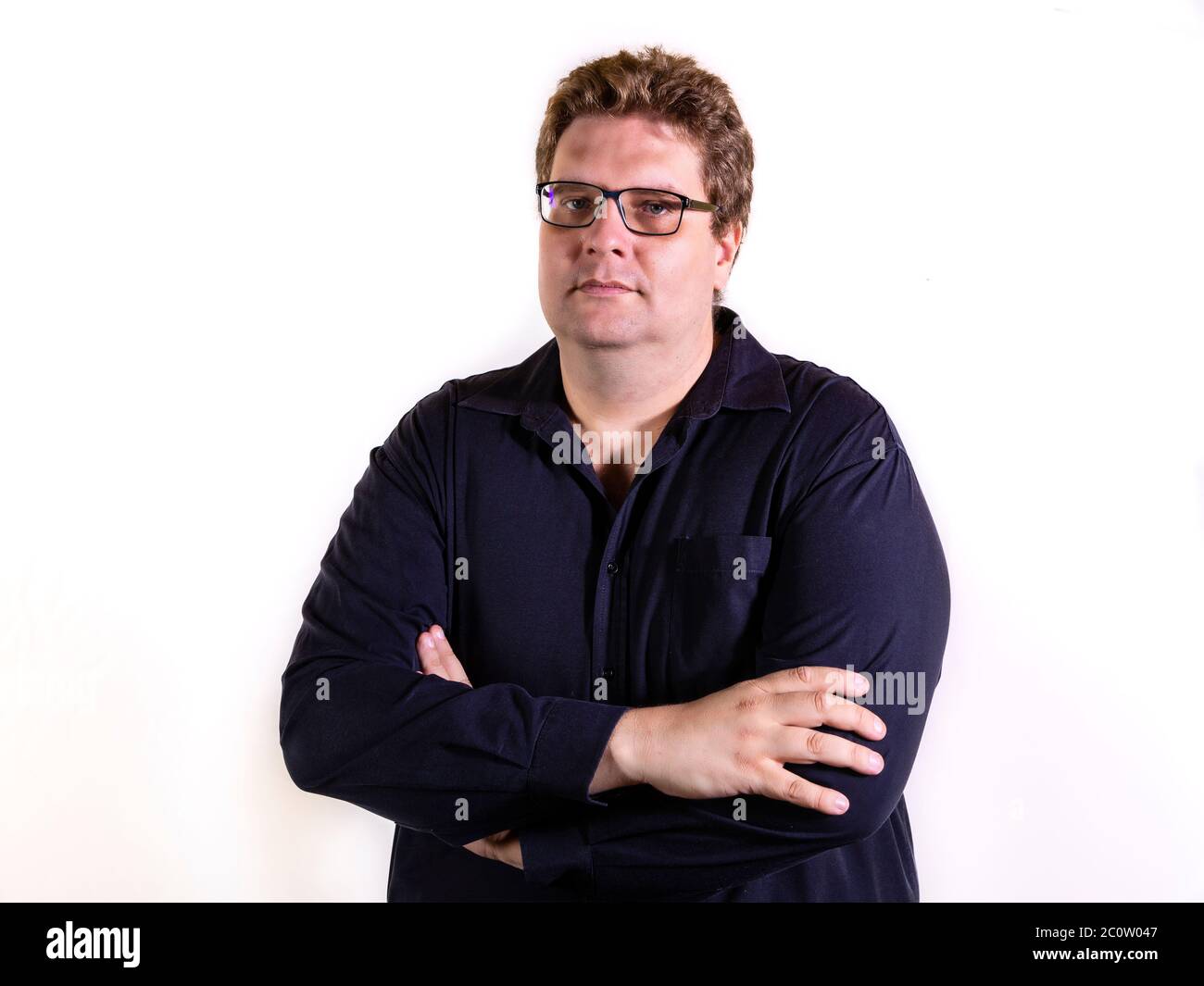Plus size man in studio photos with white background Stock Photo - Alamy