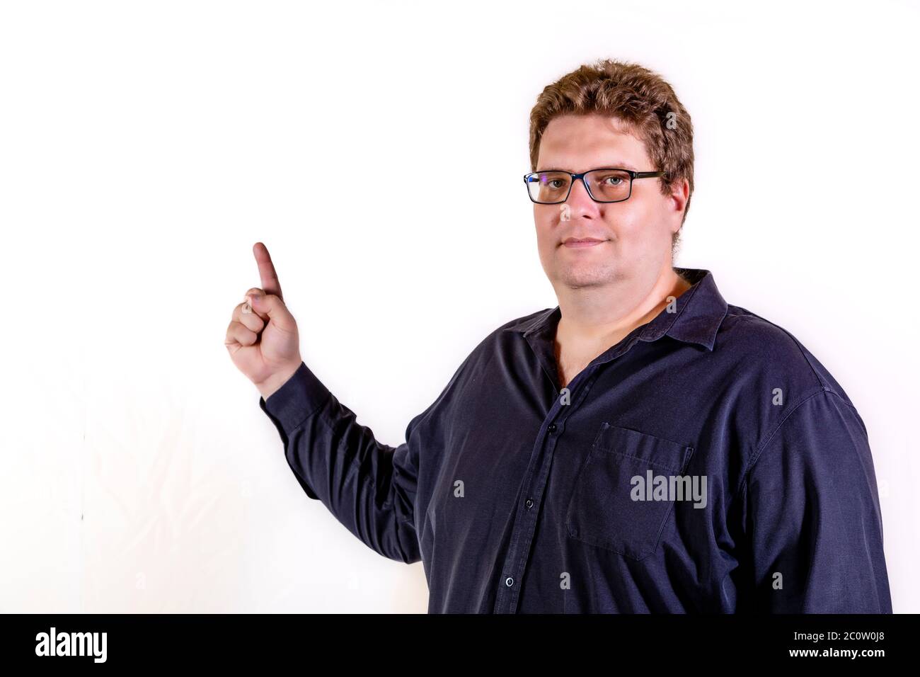 Caucasian plus size model isolated on white background pointing with ...