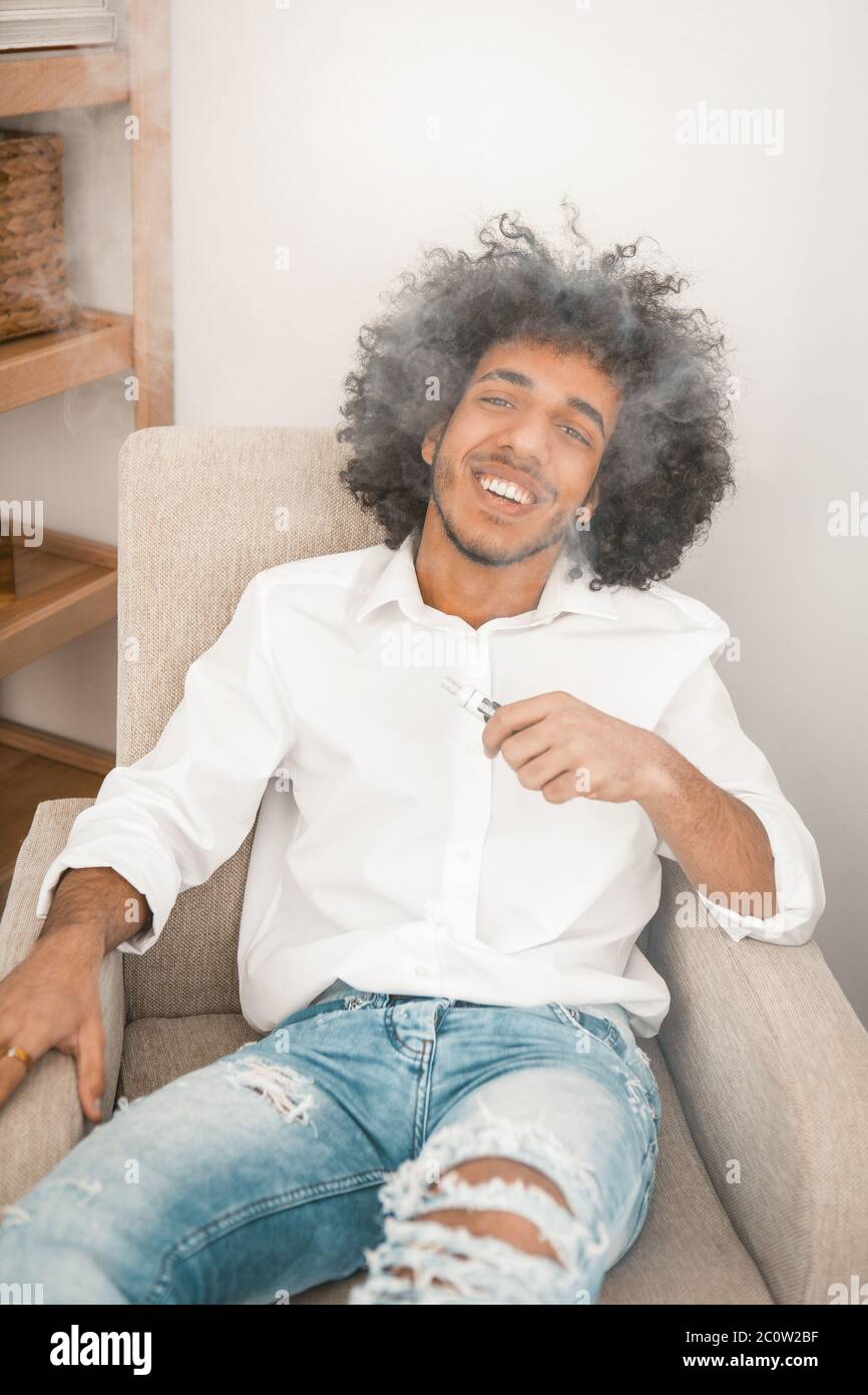 Man smoking cigarette home hi-res stock photography and images - Alamy