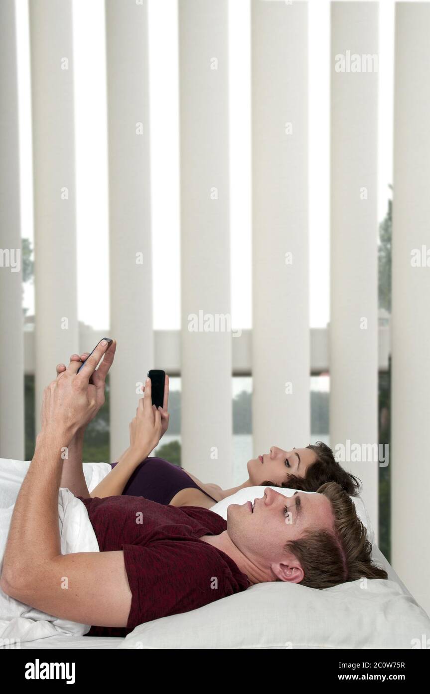 Intimate couple bed hi-res stock photography and images - Alamy