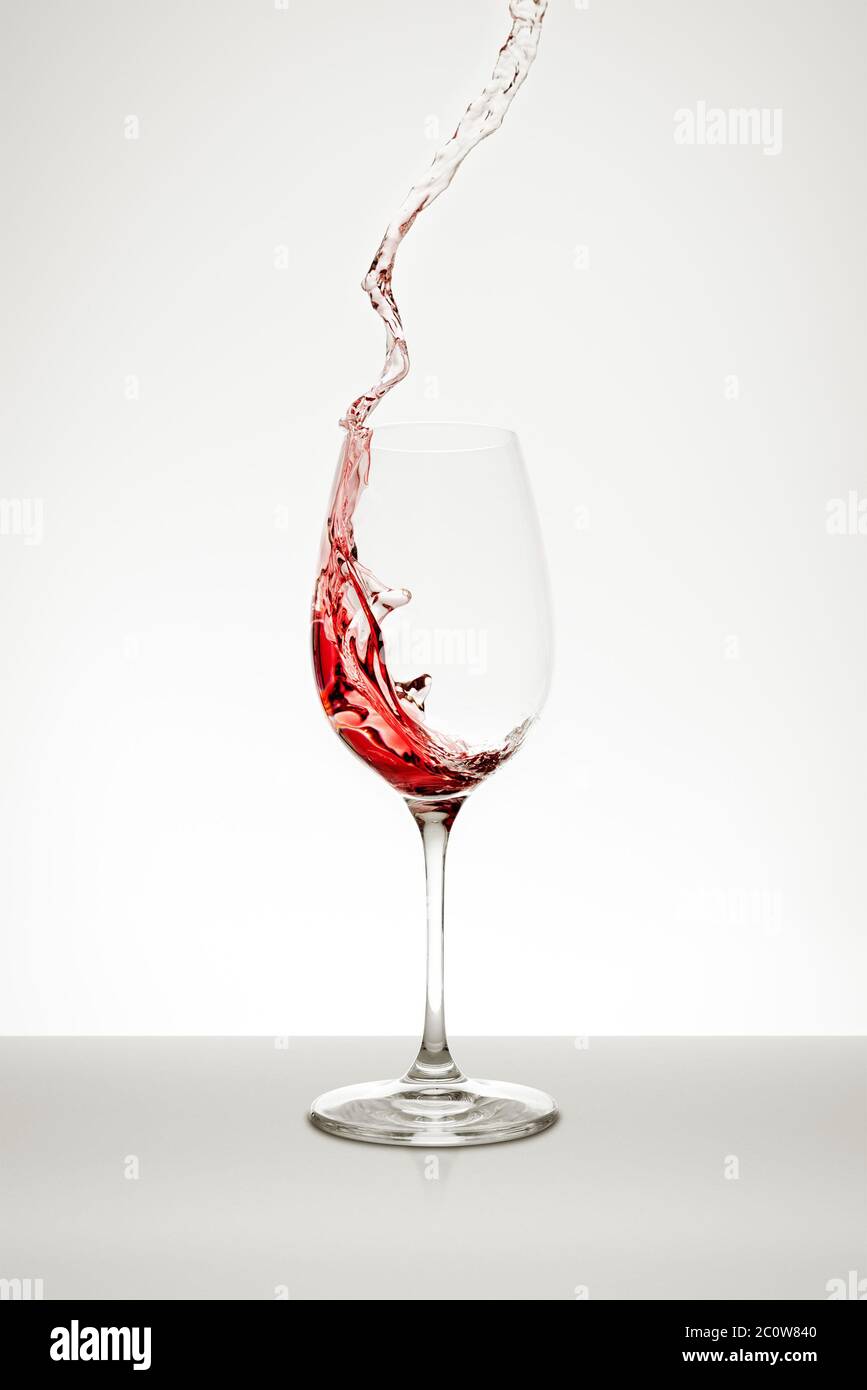wine glass splash Stock Photo - Alamy
