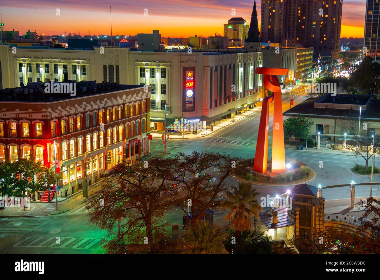 San Antonio Commerce St and The Torch of Friendship at sunrise twilight ...