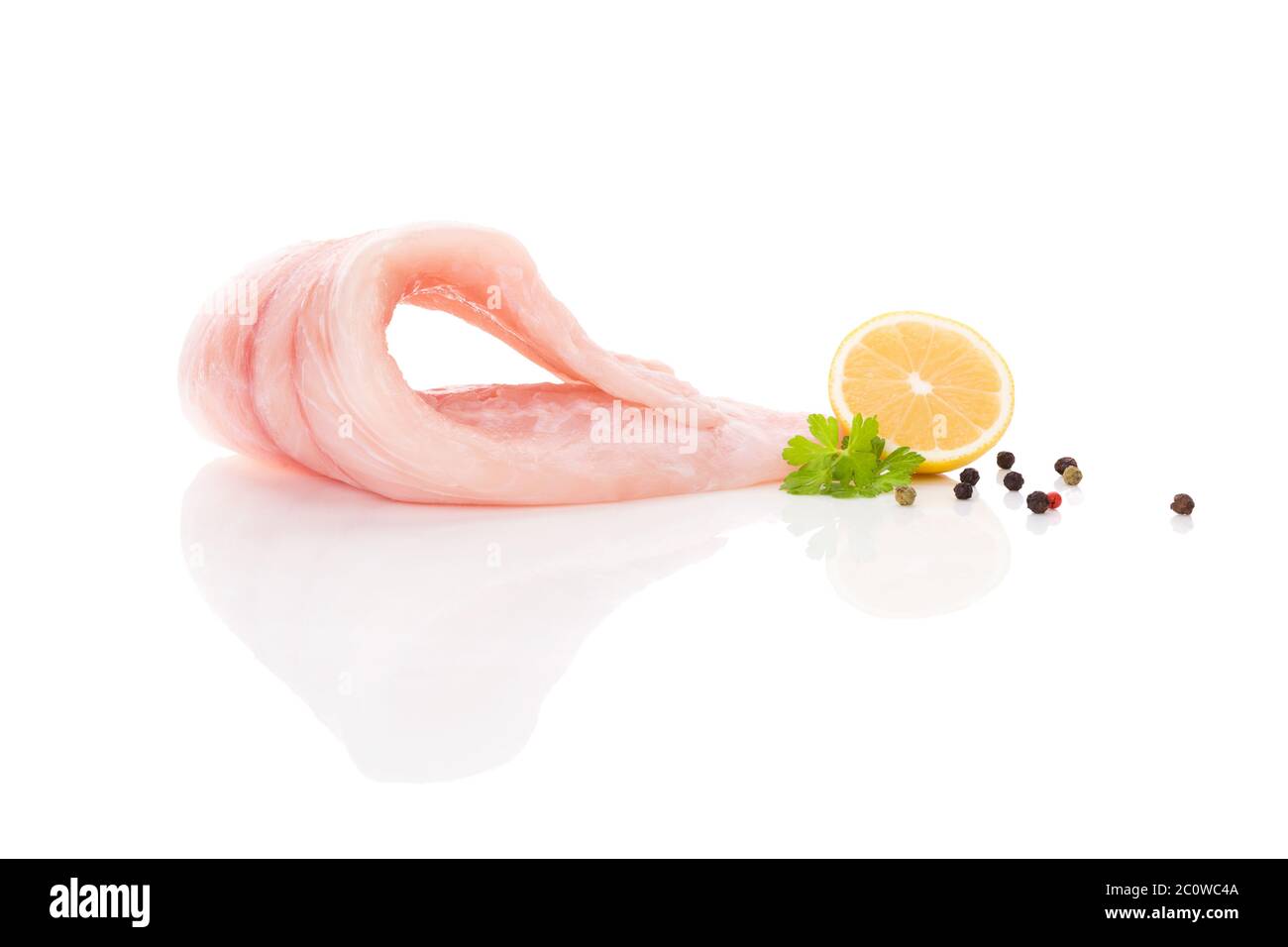 Fresh raw fish fillet isolated Stock Photo - Alamy