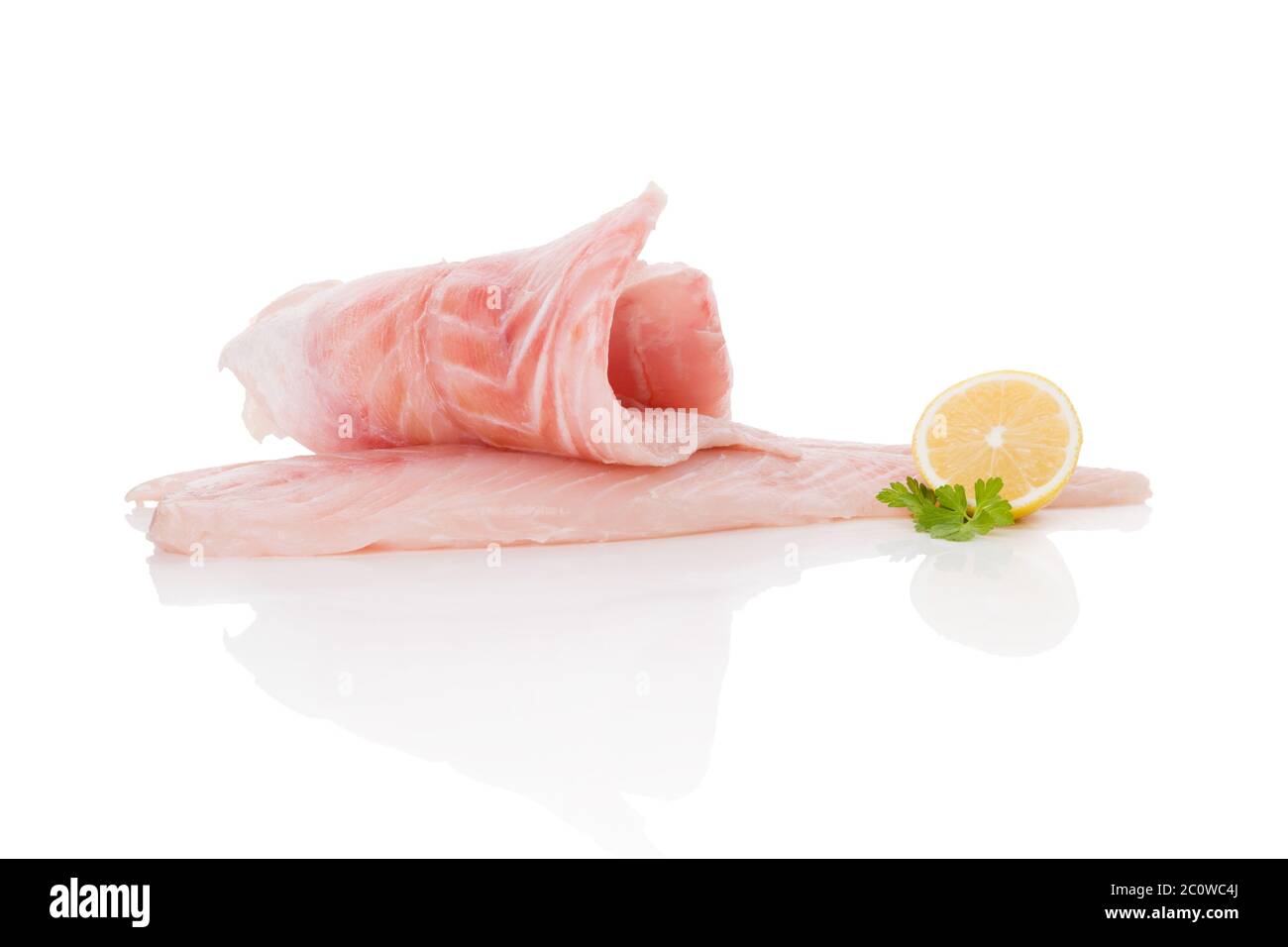 Fresh raw fish fillet isolated Stock Photo - Alamy
