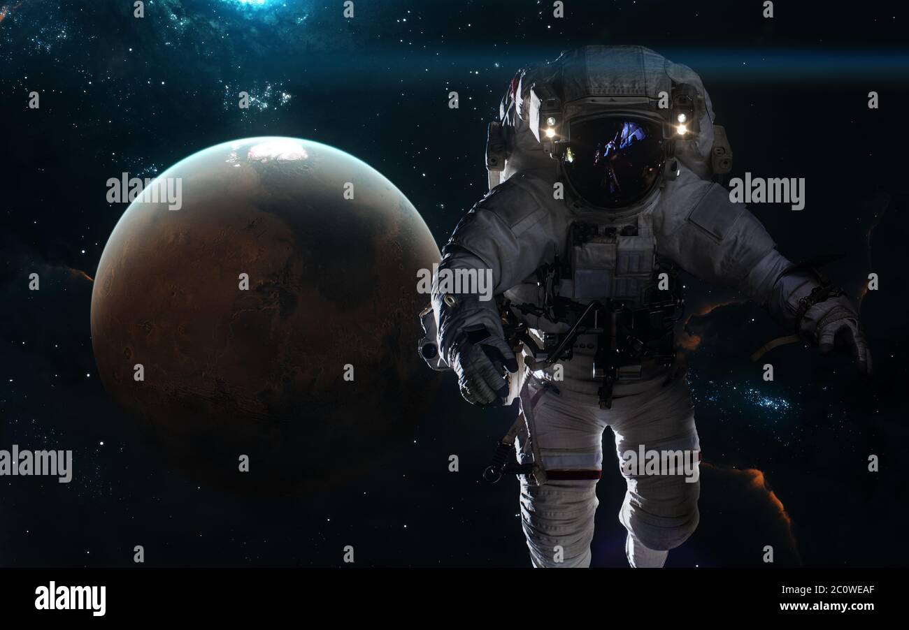 Planet Mars and astronaut. Solar system, nebulae, star clusters Stock ...