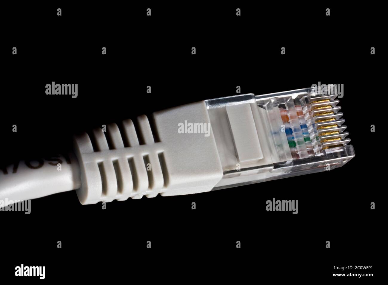 single, grey network plug in black background Stock Photo - Alamy