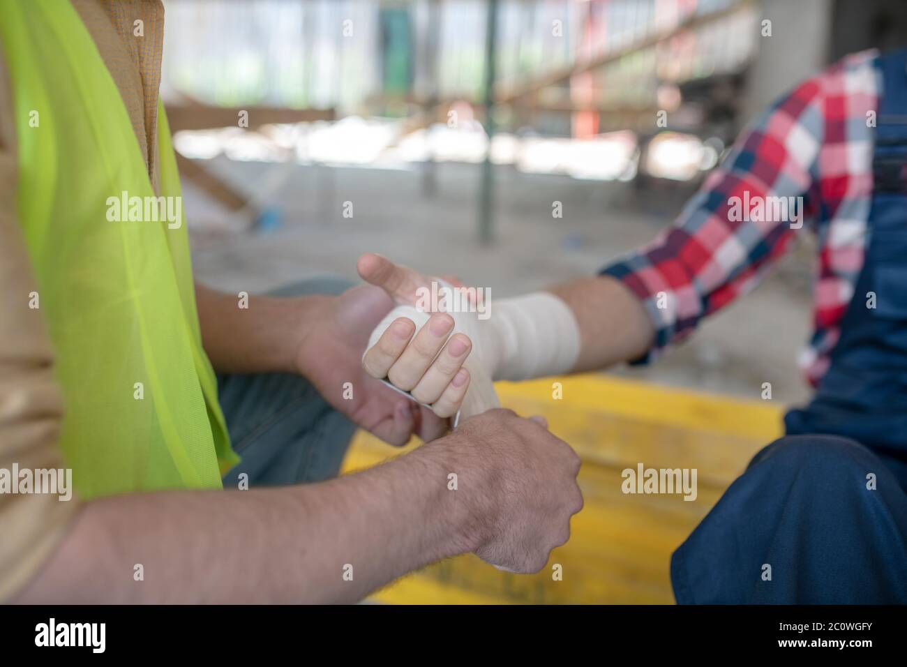 Close up worker hands apply hi-res stock photography and images - Alamy