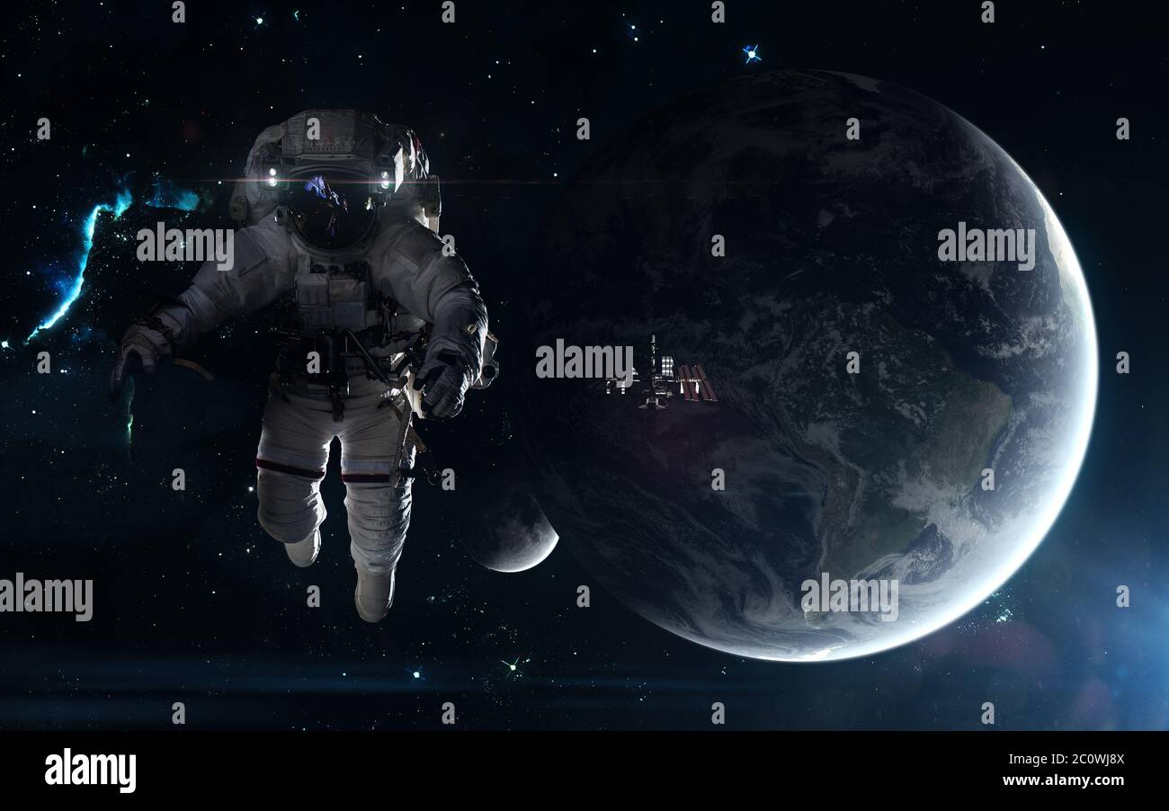 Astronaut and ISS on the background of Earth and Moon. Star clusters ...