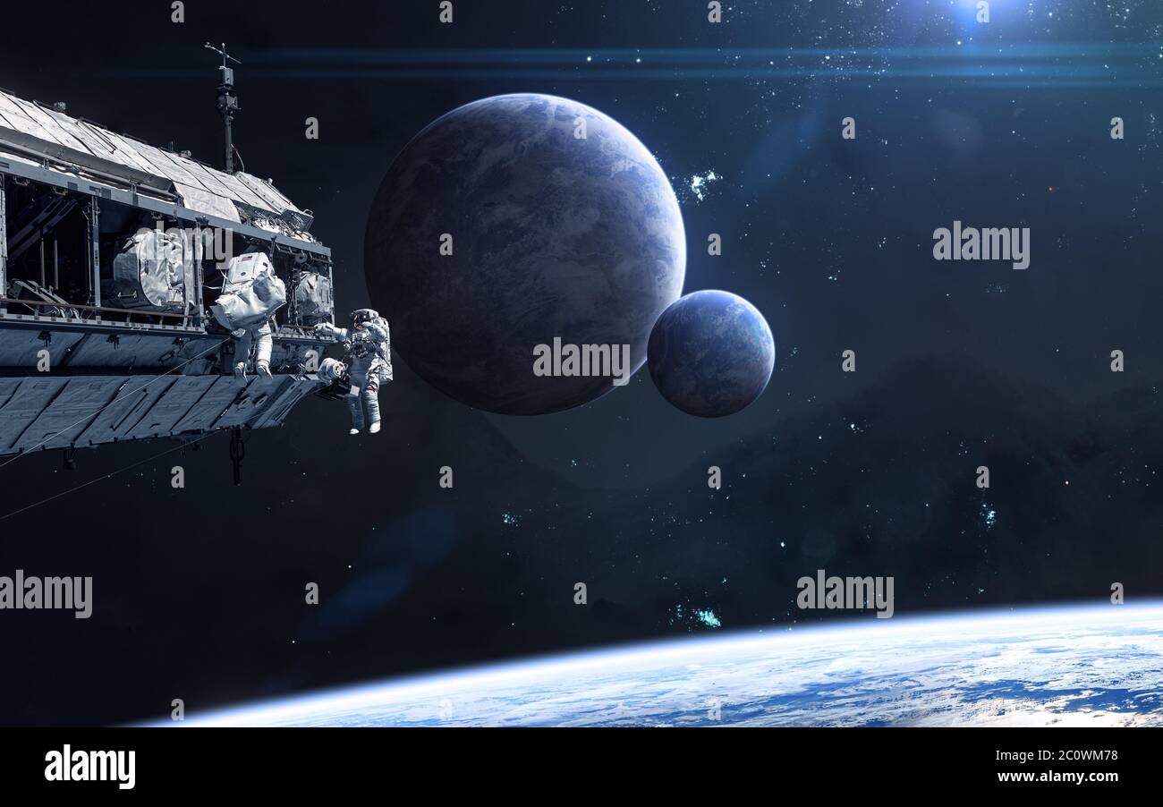 Planets in deep space. Space station, astronauts Stock Photo - Alamy
