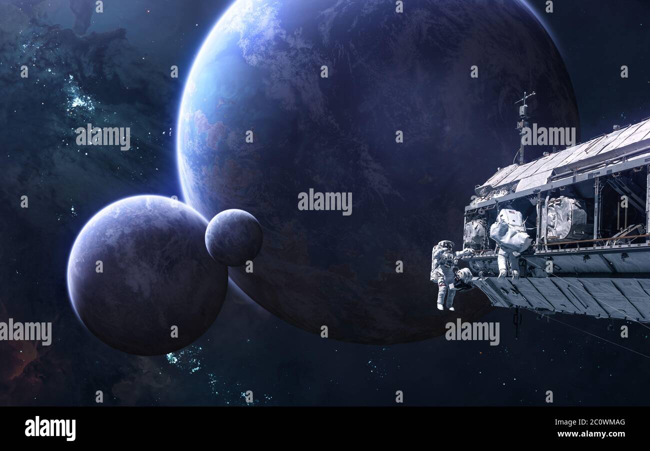 Planets in deep space astronauts space station Stock Photo - Alamy