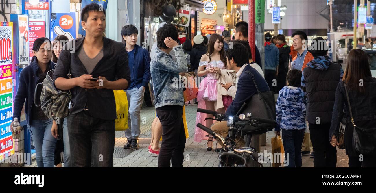 Huge crowd of people in the street of Shibuya during Halloween night ...