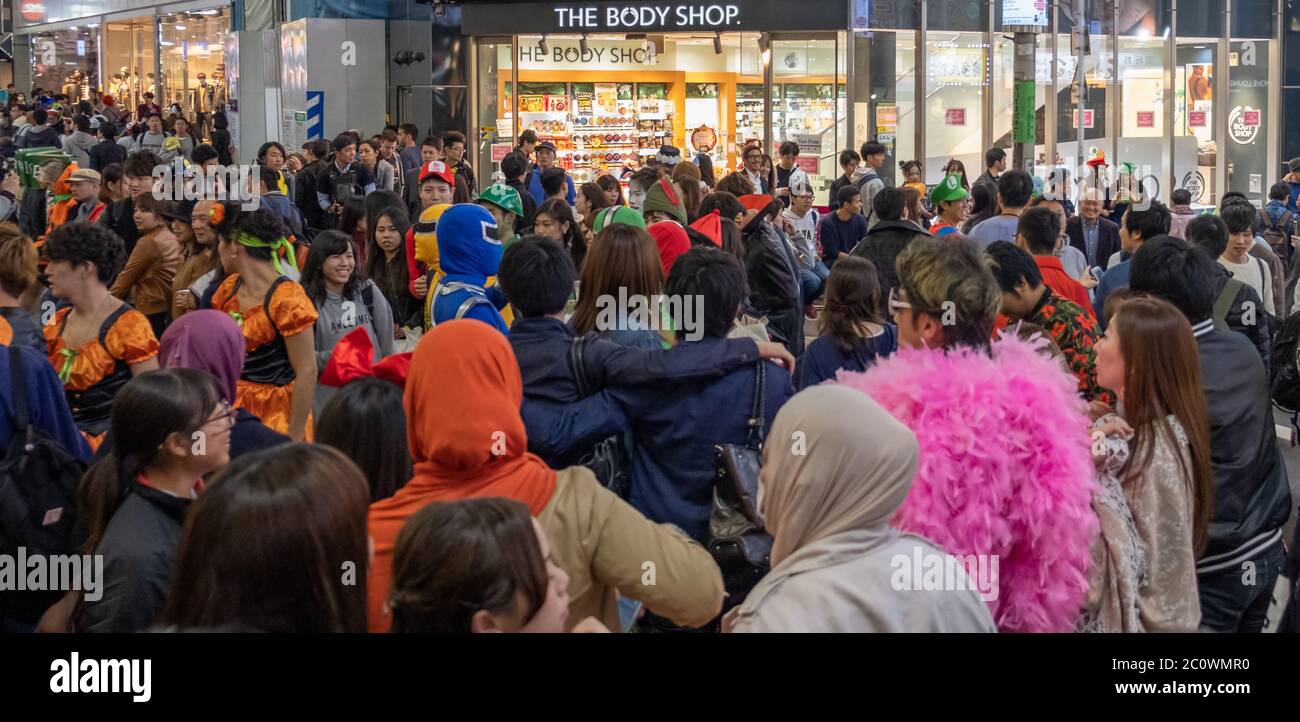Huge crowd of people in the street of Shibuya during Halloween night ...