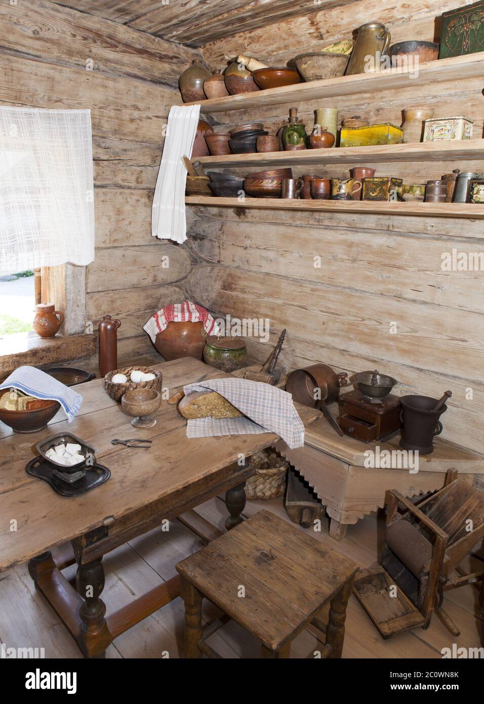 ancient kitchen in a wooden log hut, Russia Stock Photo - Alamy