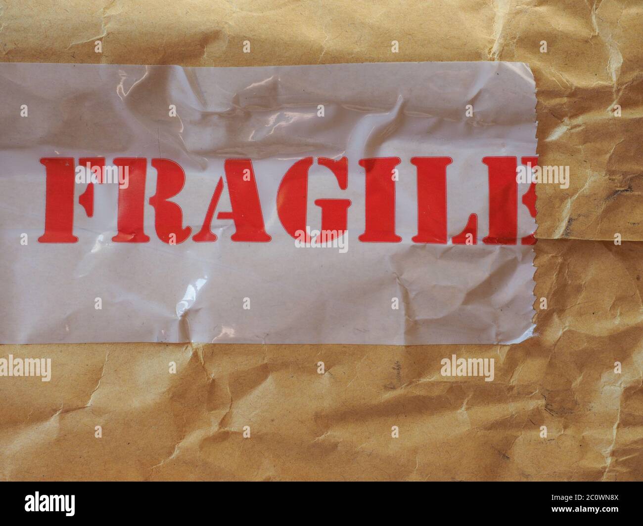 Fragile label on packet Stock Photo - Alamy