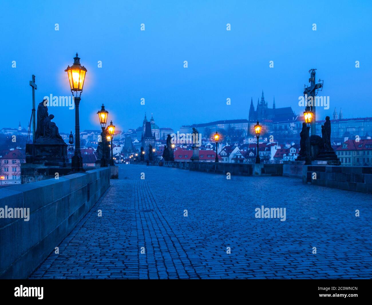 Charles Bridge and Prague Castle in blue hour before sunrise, Prague ...