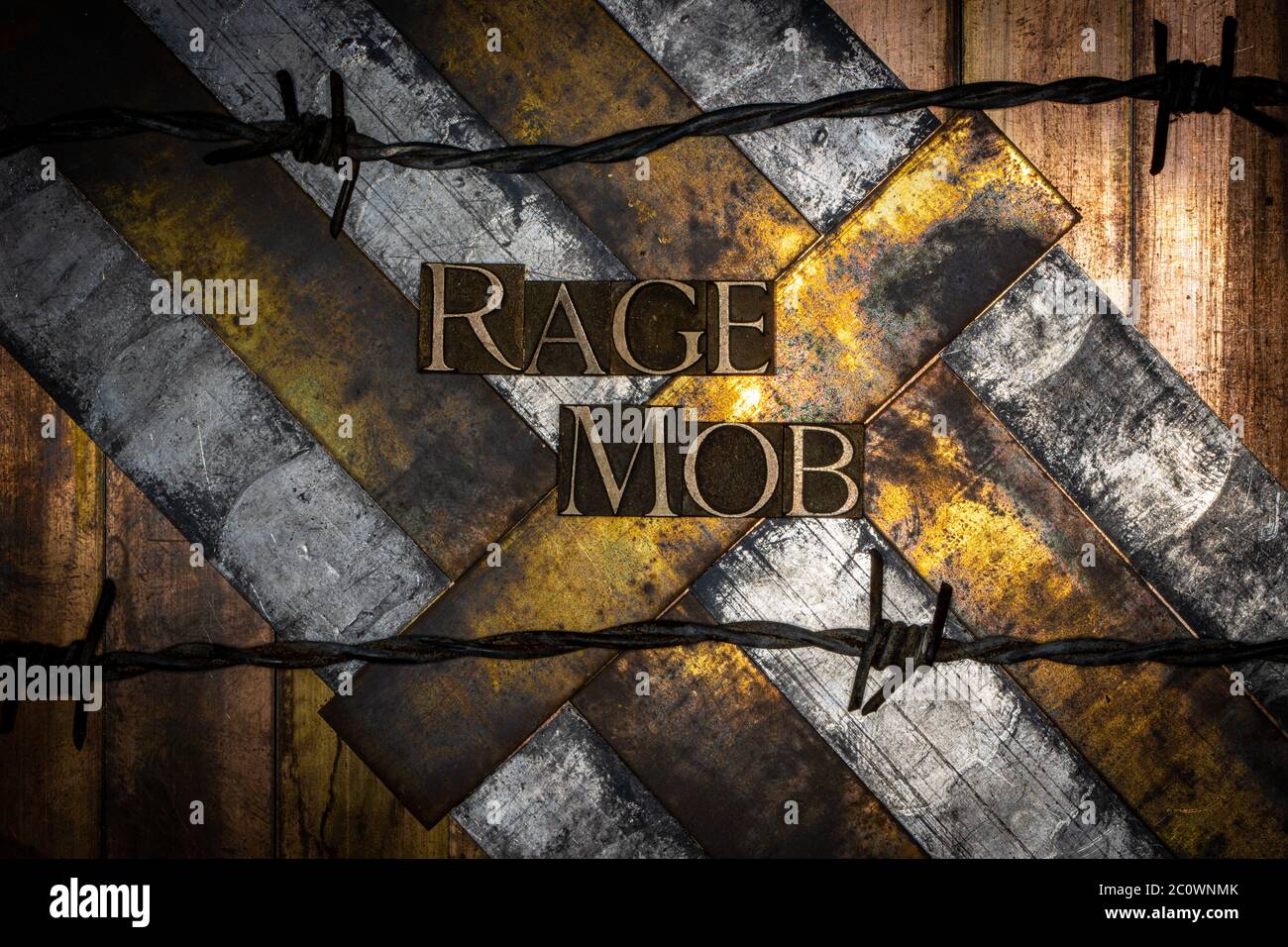 Photo of real authentic typeset letters forming Rage Mob text on ...