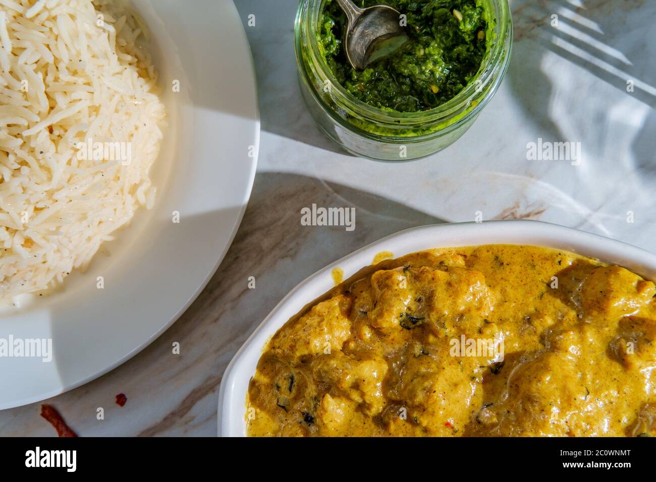 Authentic Indian almond chicken korma curry dinner with basmati rice ...
