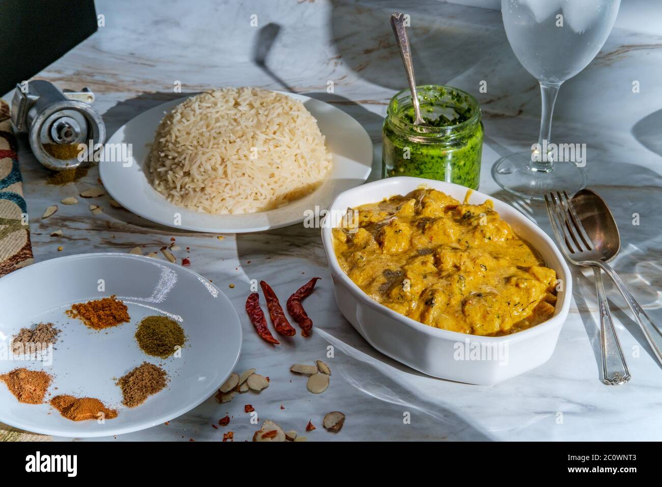 Authentic Indian almond chicken korma curry dinner with basmati rice ...