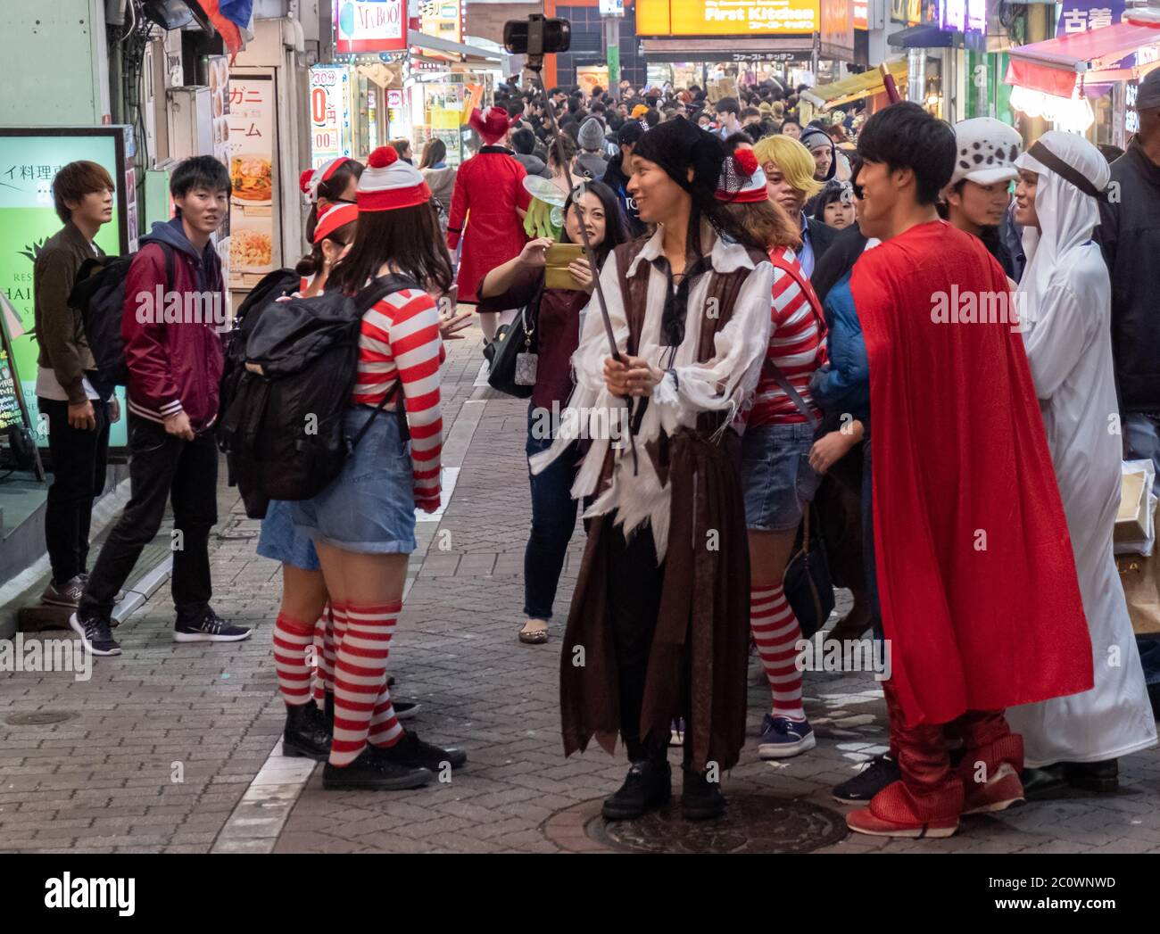 Japanese Halloween revelers with costumes, in Shibuya street at night ...