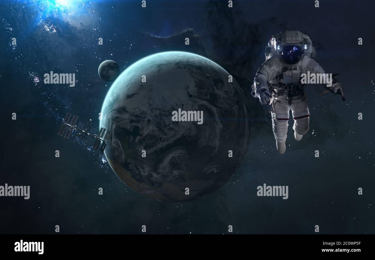 Solar system in blue rays. Earth, Moon, astronaut, ISS Stock Photo - Alamy