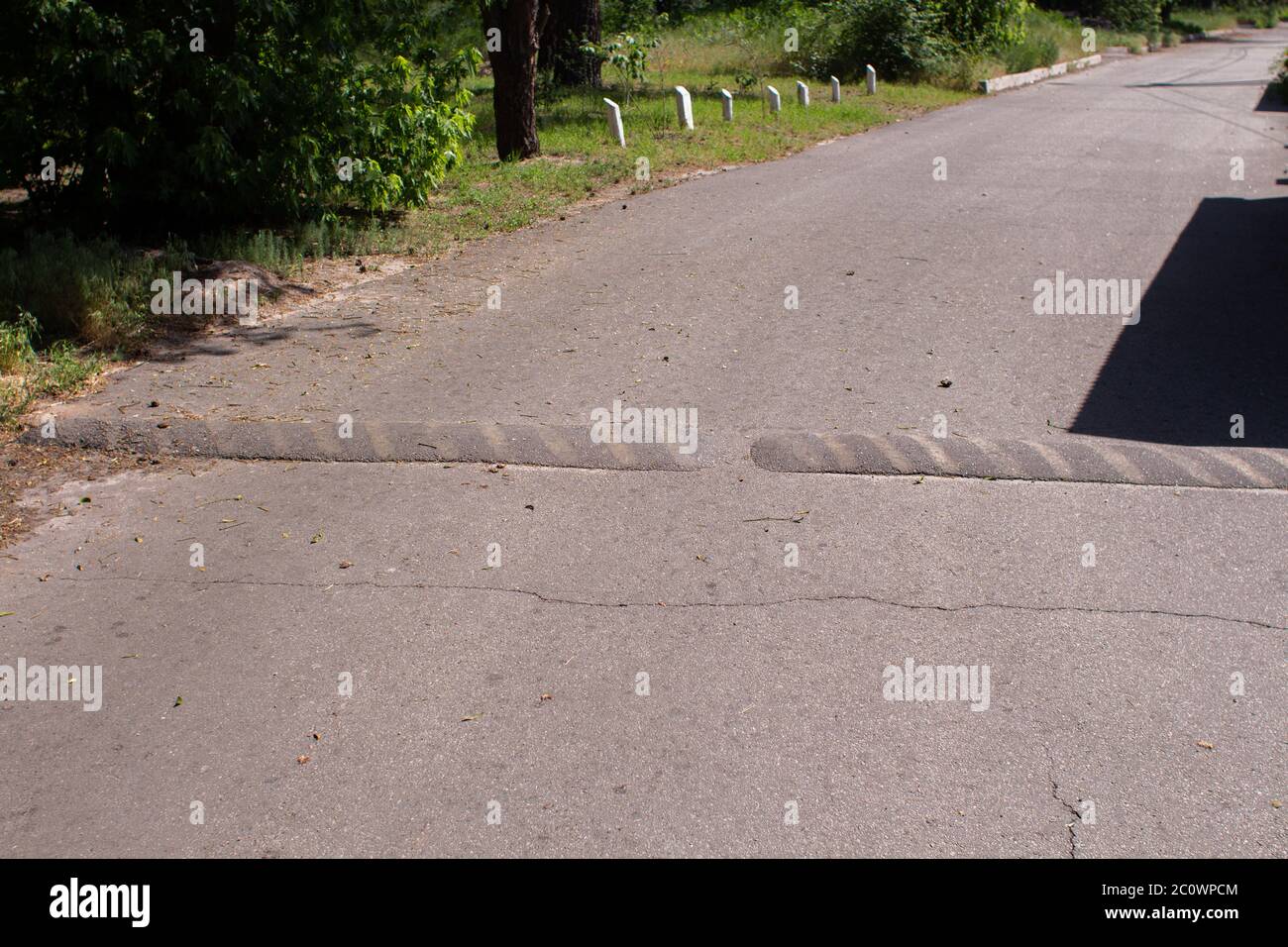 Speed bump on empty hi-res stock photography and images - Alamy