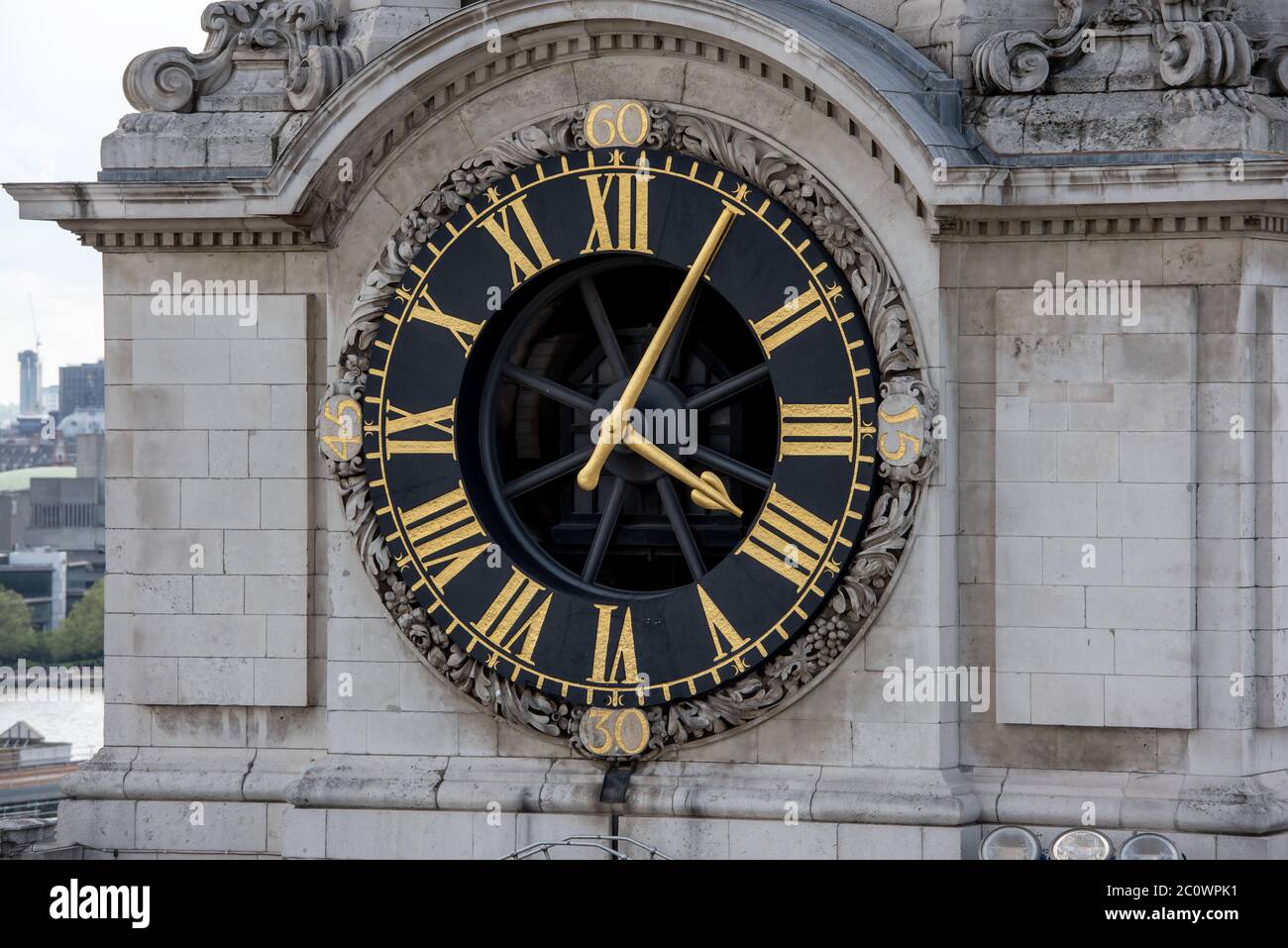 St Paul's Cathedral, London, England. A clock face on one of the clock ...