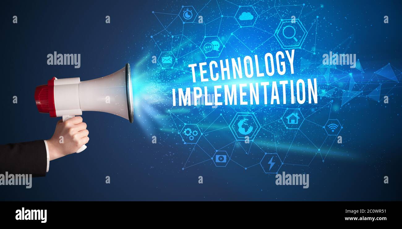 Young woman shouting in megaphone with TECHNOLOGY IMPLEMENTATION ...