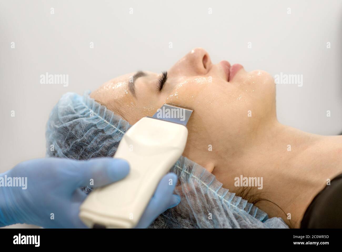 Face cleaning in a beauty salon - close-up of a woman's face Stock ...