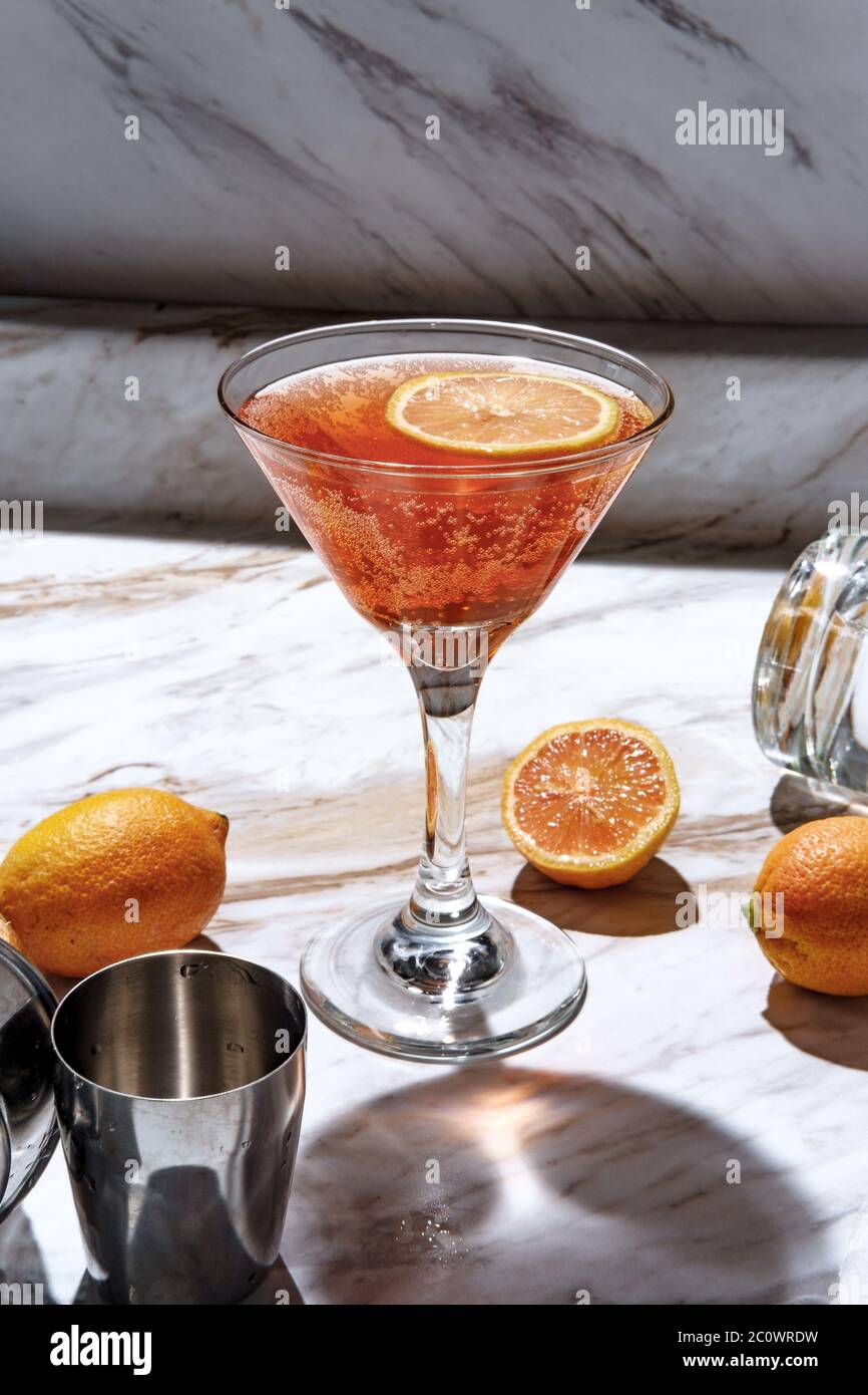 Pink lemon drop martini on marble kitchen counter Stock Photo - Alamy