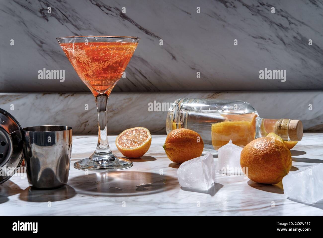 Pink lemon drop martini on marble kitchen counter Stock Photo - Alamy