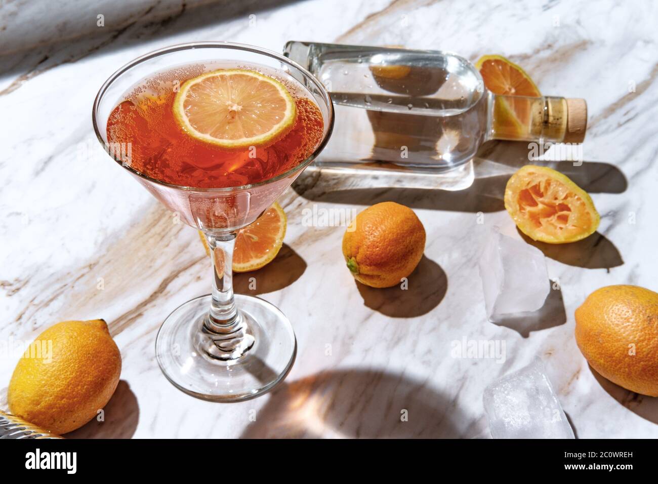 Pink lemon drop martini on marble kitchen counter Stock Photo - Alamy