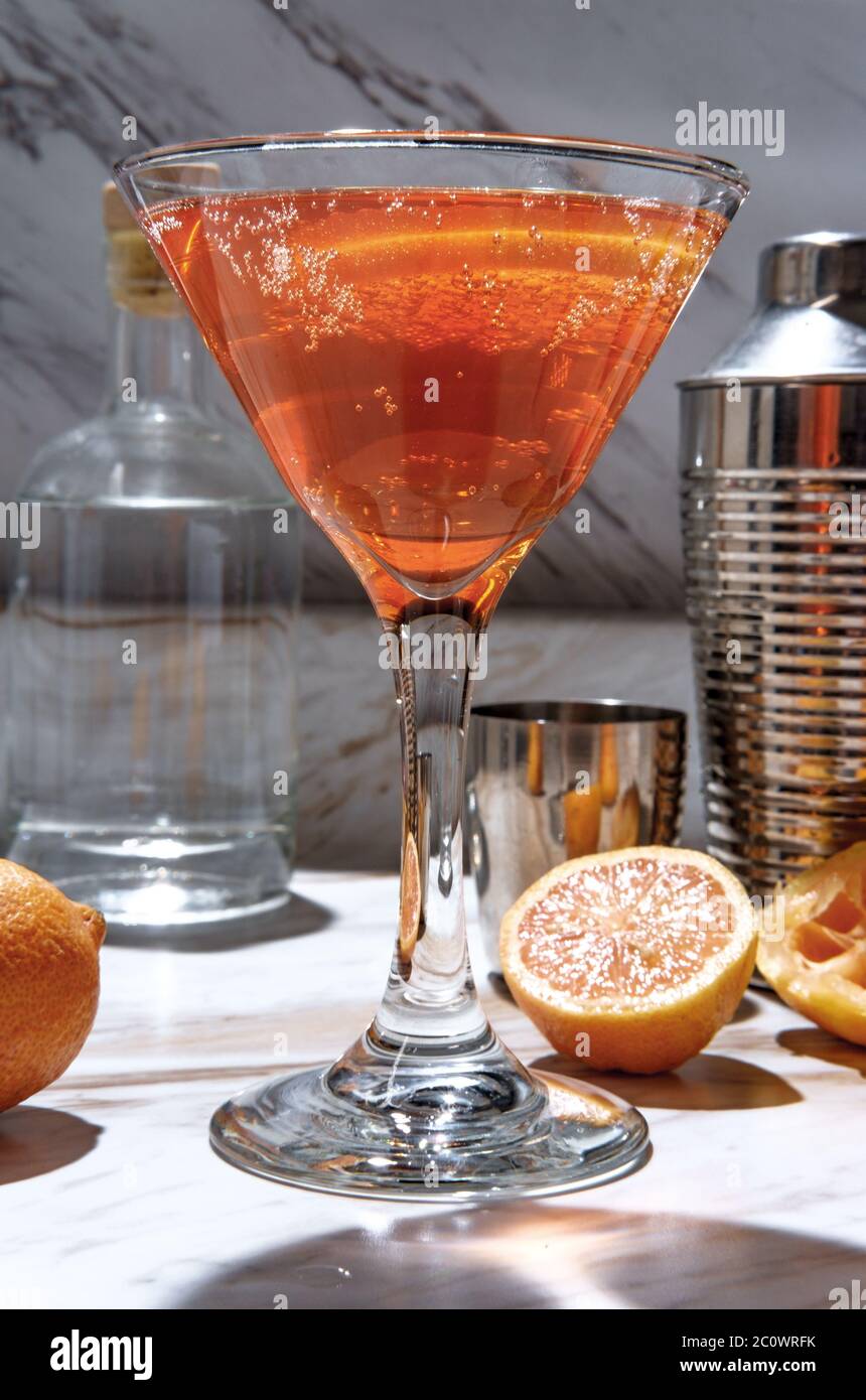 Pink lemon drop martini on marble kitchen counter Stock Photo - Alamy