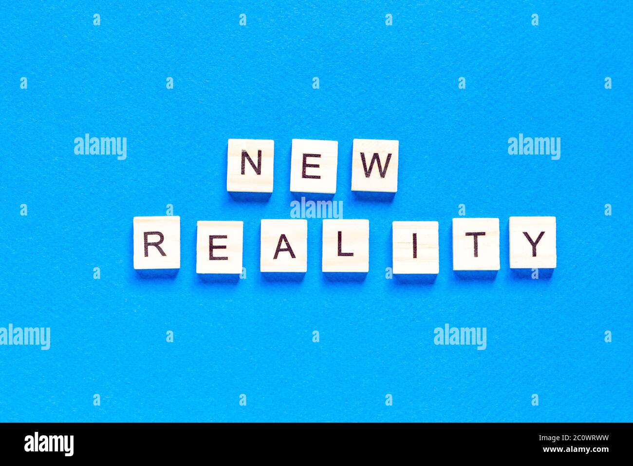 NEW REALITY. the words new reality are written in wooden letters on a ...